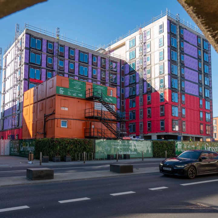 Salford eco-friendly affordable apartment block reaches highest point ...